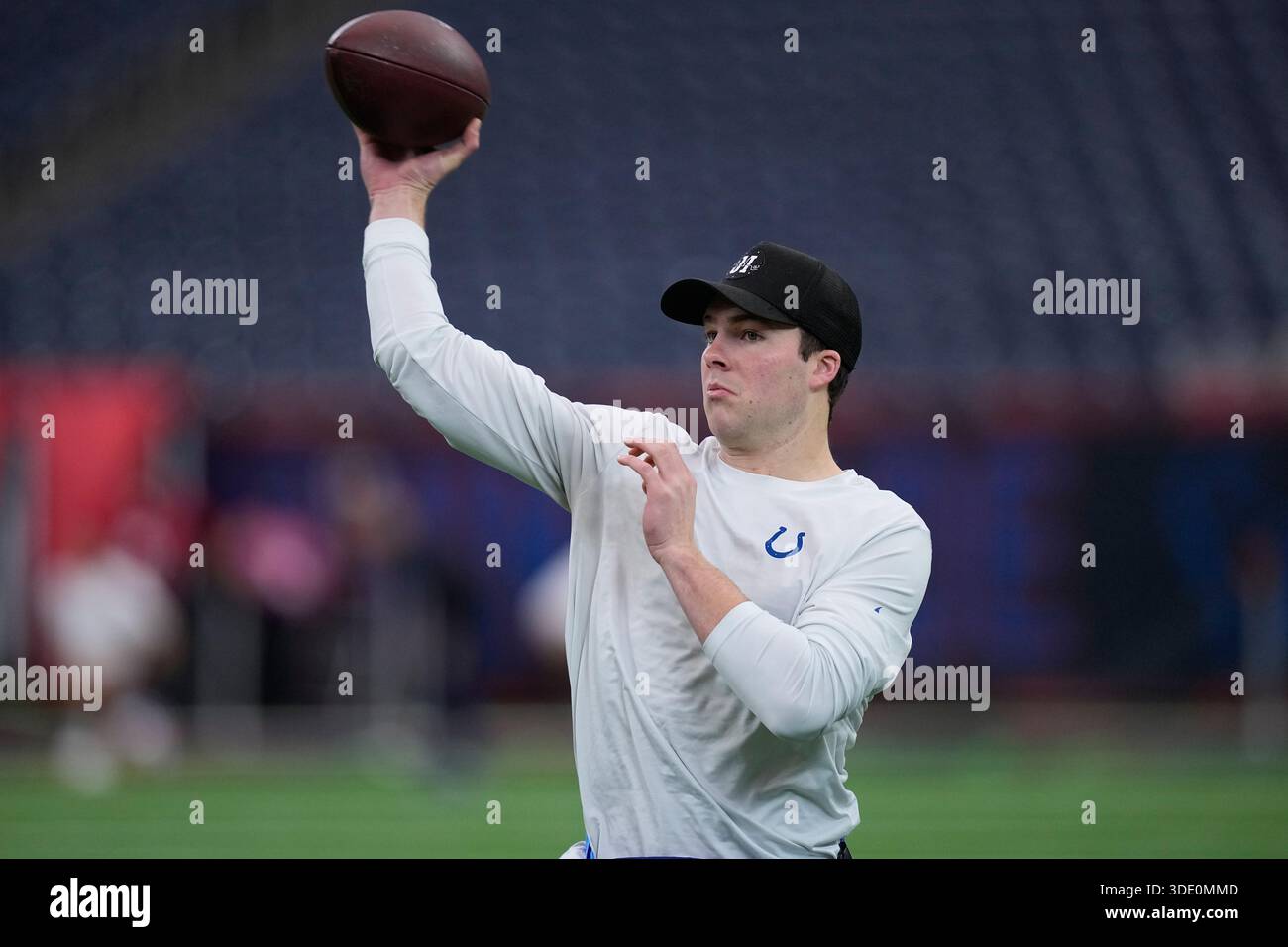 Indianapolis Colts quarterback Riley Leonard (15) warms up before an ...
