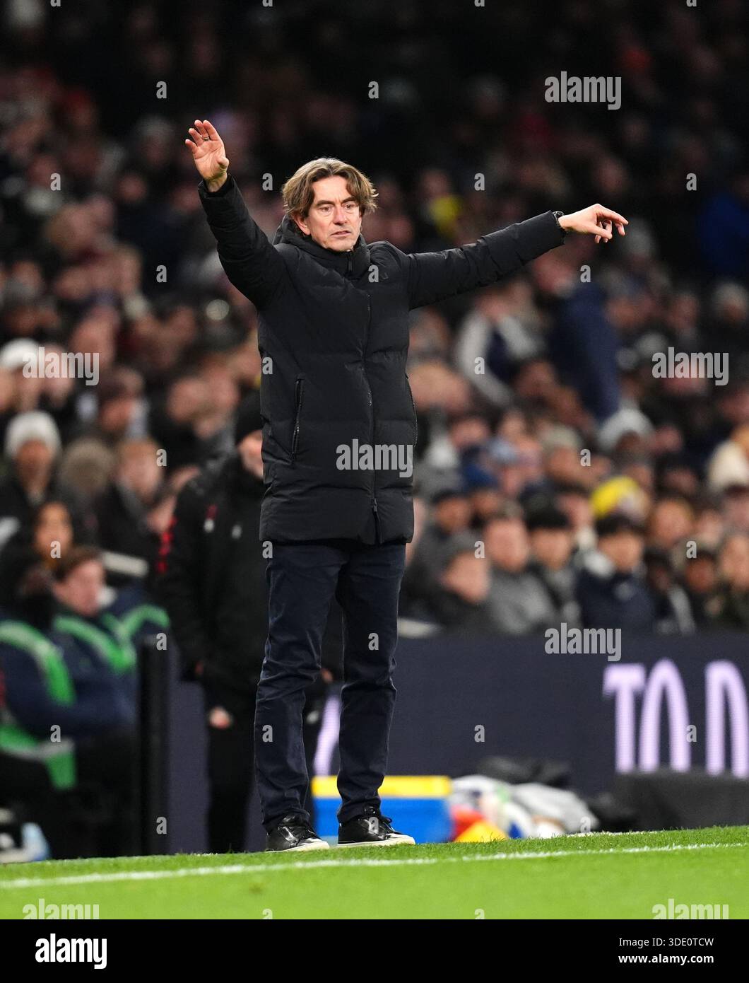 Tottenham Hotspur manager Thomas Frank reacts on the touchline during ...