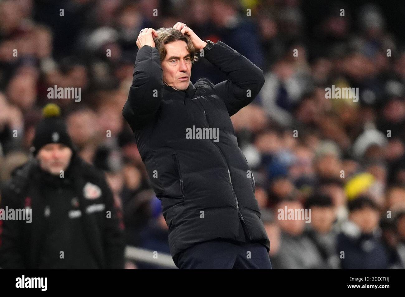Tottenham Hotspur manager Thomas Frank reacts on the touchline during ...