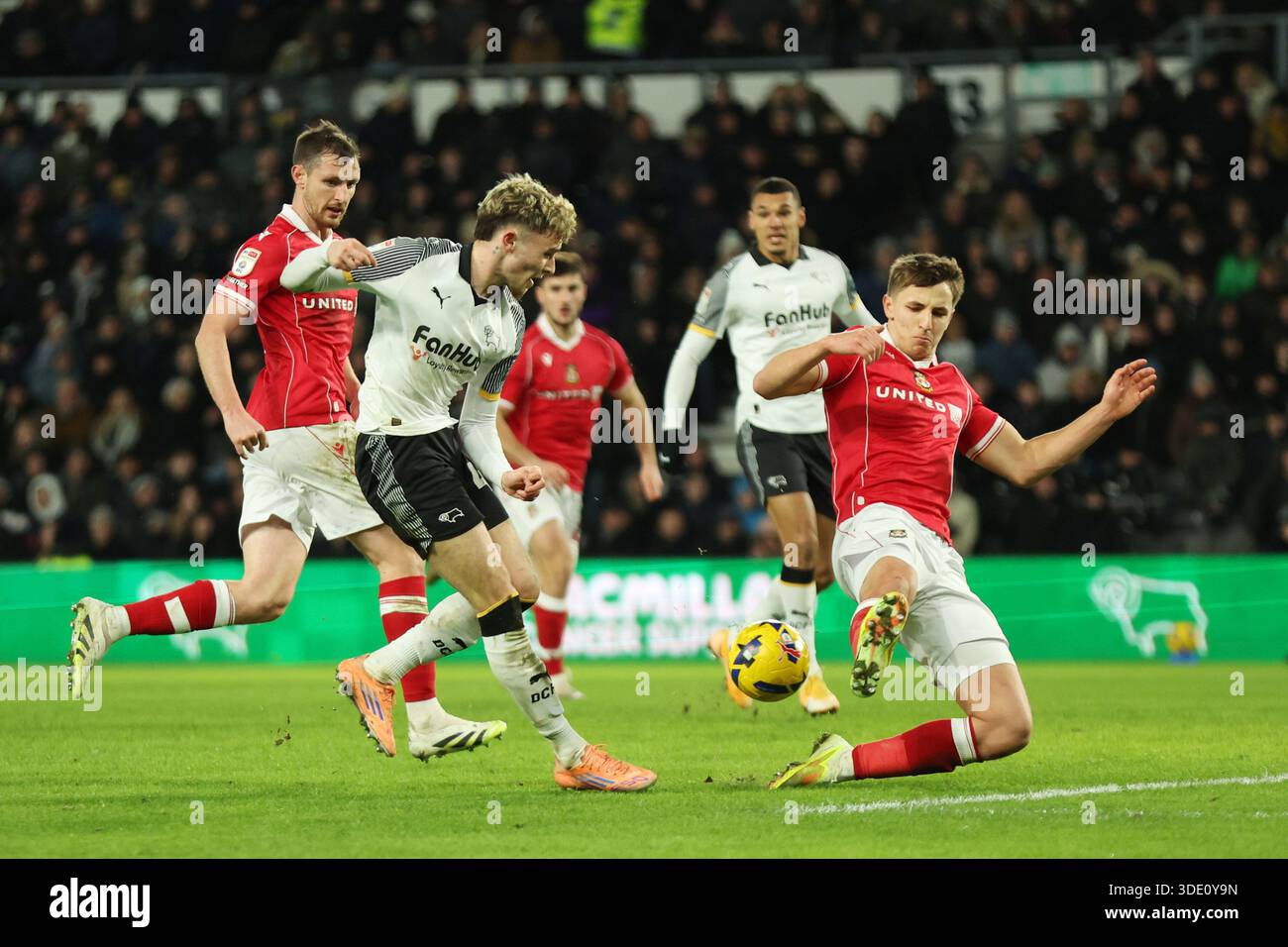 Derby County's Bobby Clark (second left) takes a shot on goal during ...