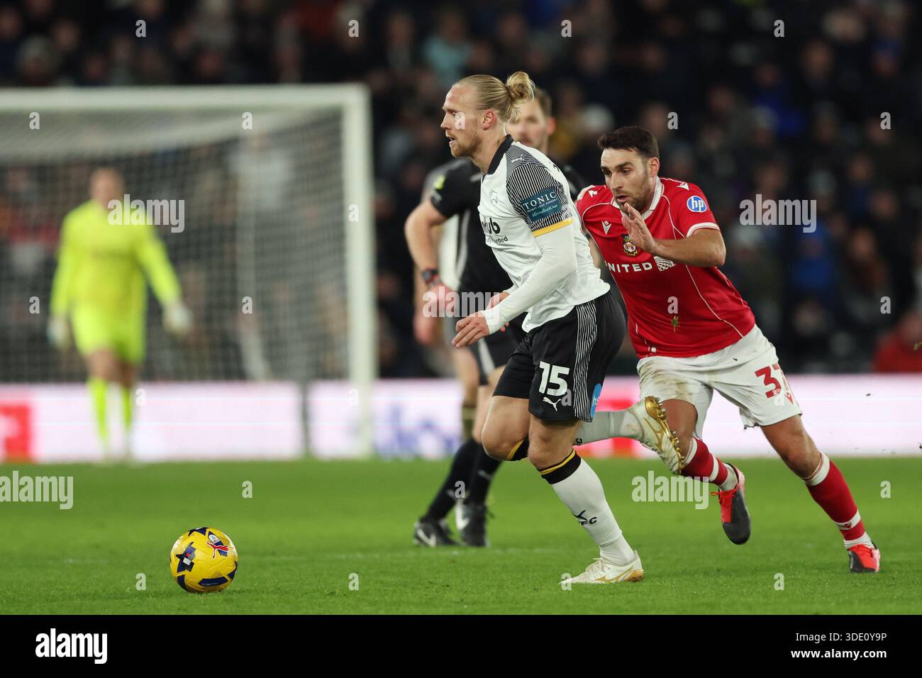 Derby County's Lars-Jorgen Salvesen (left) and Wrexham’s Matthew James ...