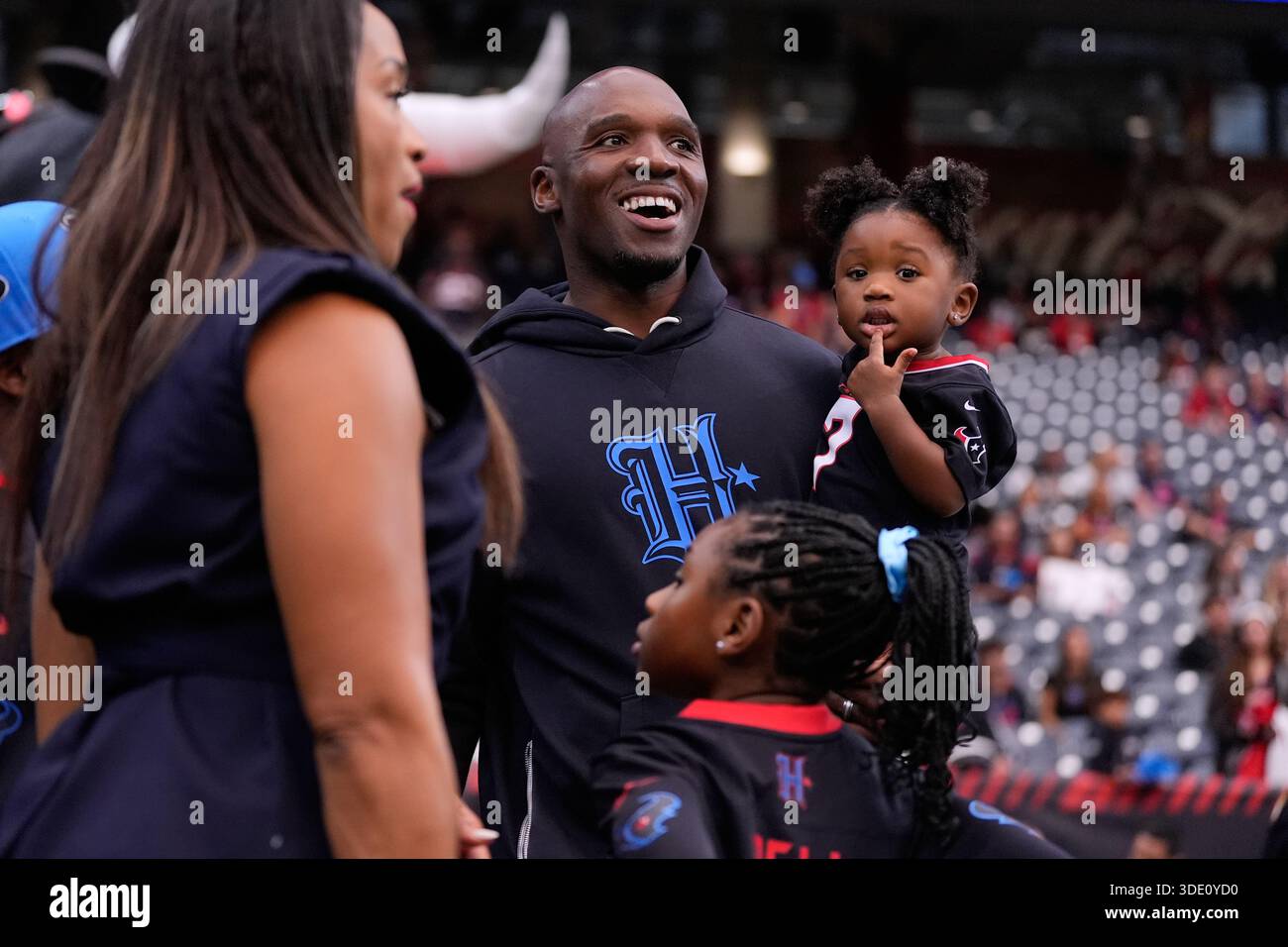 Houston Texans head coach Demeco Ryans, center, stands with his family ...