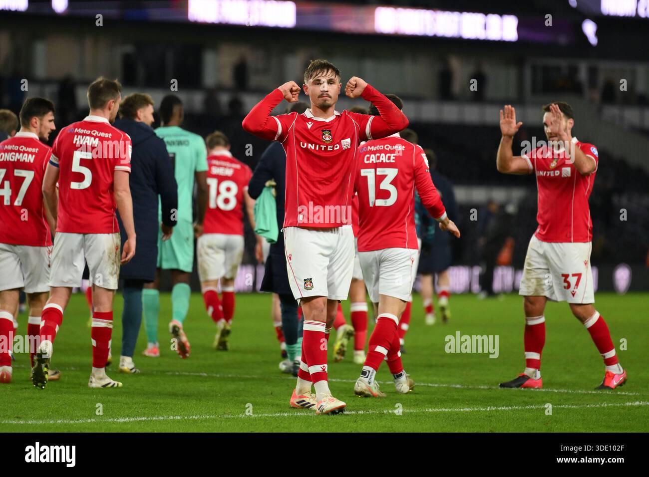 Callum Doyle of Wrexham celebrates victory during the Sky Bet ...