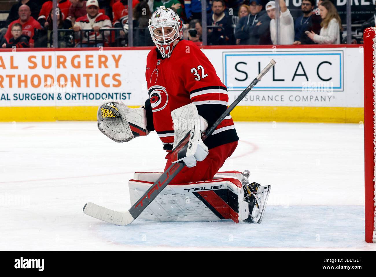 Carolina Hurricanes goaltender Brandon Bussi (32) watches the puck ...