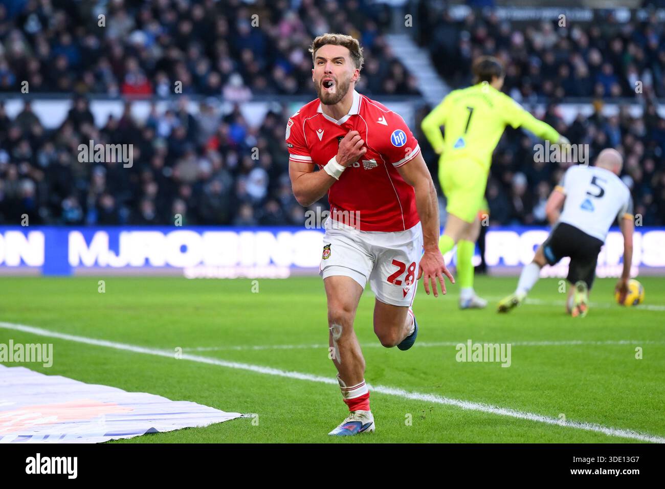 Sam Smith of Wrexham celebrates after scoring a goal to make it 0-1 ...