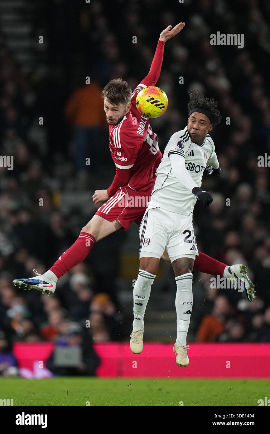 Liverpool's Conor Bradley jumps for a header with Fulham's Kevin during ...