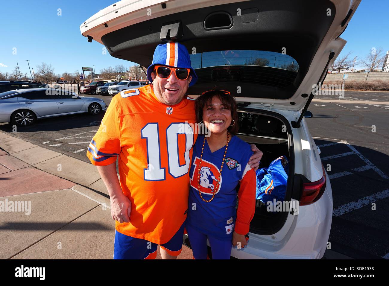 Ralph and Money LeDoux of Westminster, Colo., take part in a tailgate ...