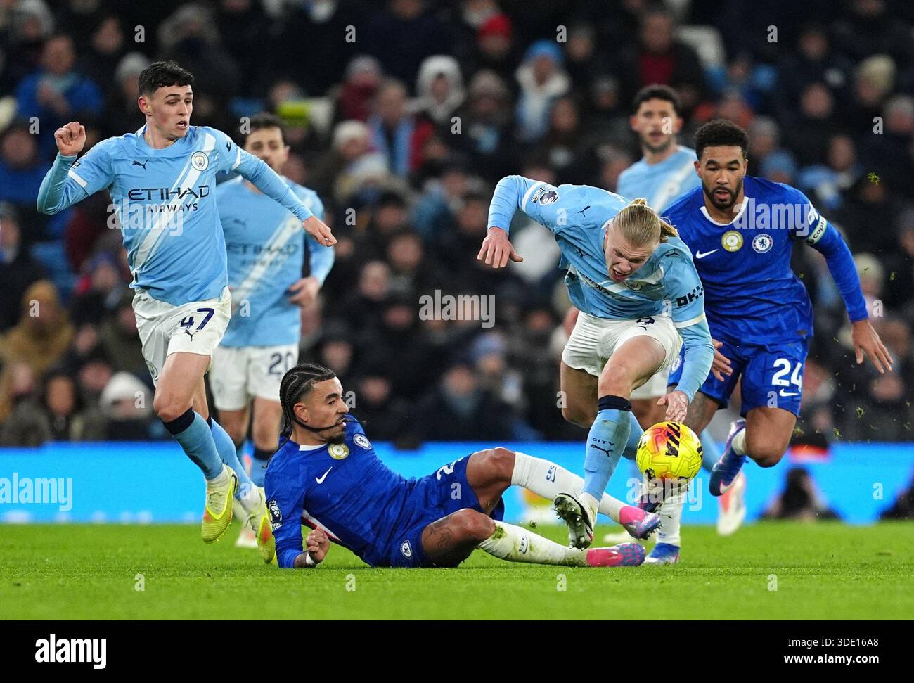 Chelsea's Malo Gusto challenges Manchester City's Erling Haaland during ...