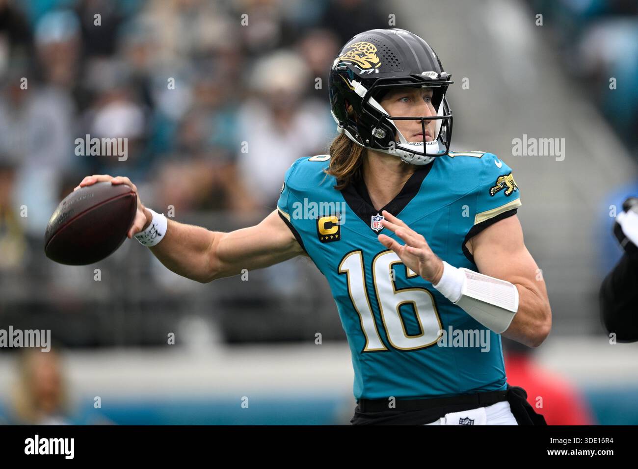 Jacksonville Jaguars quarterback Trevor Lawrence (16) looks to throw a ...