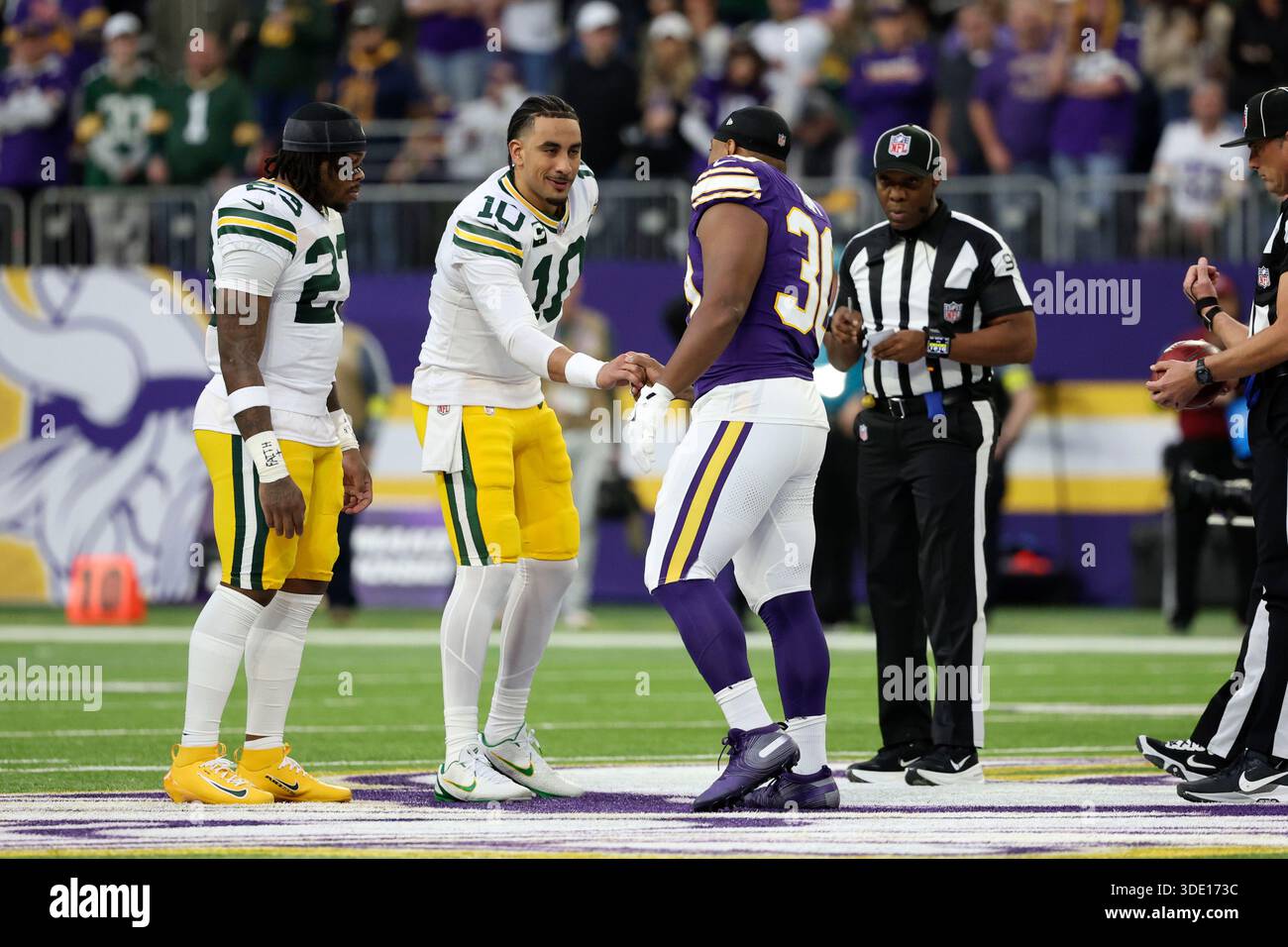 Green Bay Packers quarterback Jordan Love (10) greets Minnesota Vikings ...