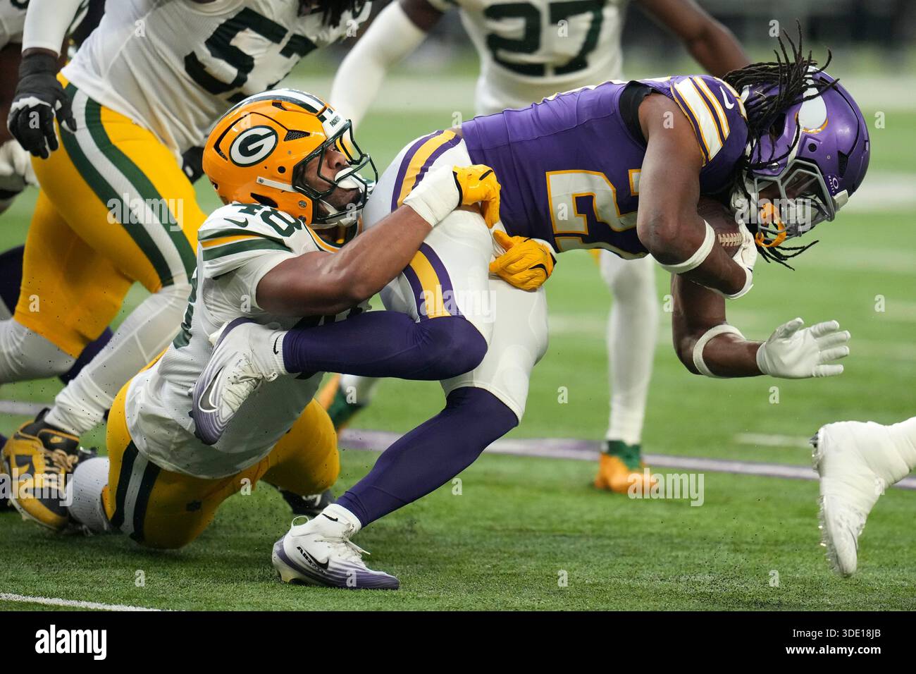 Green Bay Packers linebacker Jamon Johnson (48) tackles Minnesota ...