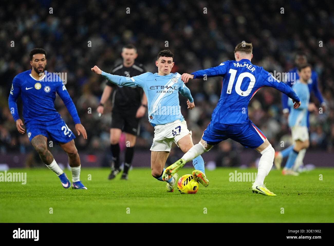Manchester City's Phil Foden and Chelsea's Cole Palmer battle for the ...