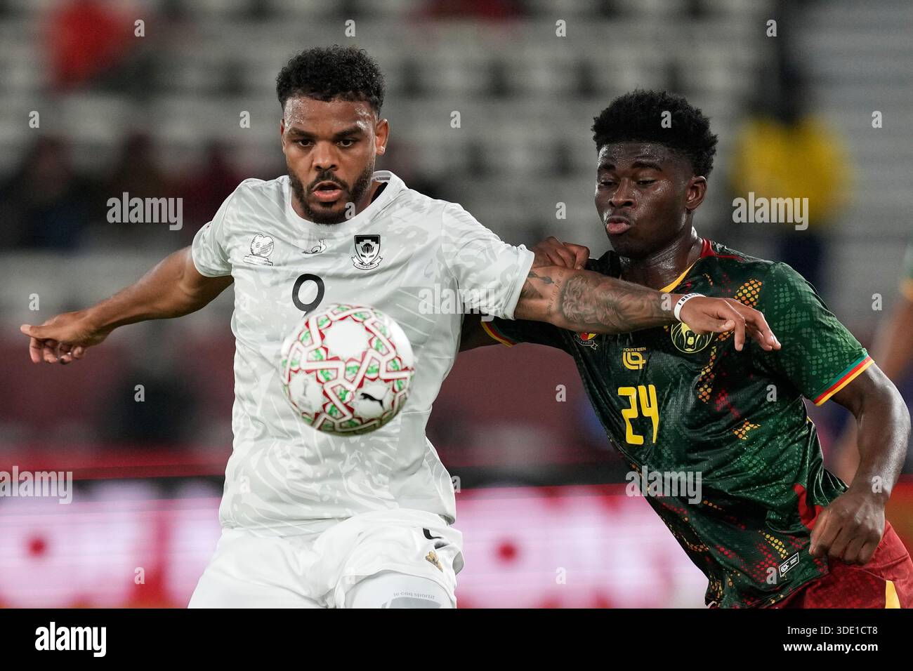 South Africa's Lyle Foster and Cameroon's Carlos Baleba challenge for ...