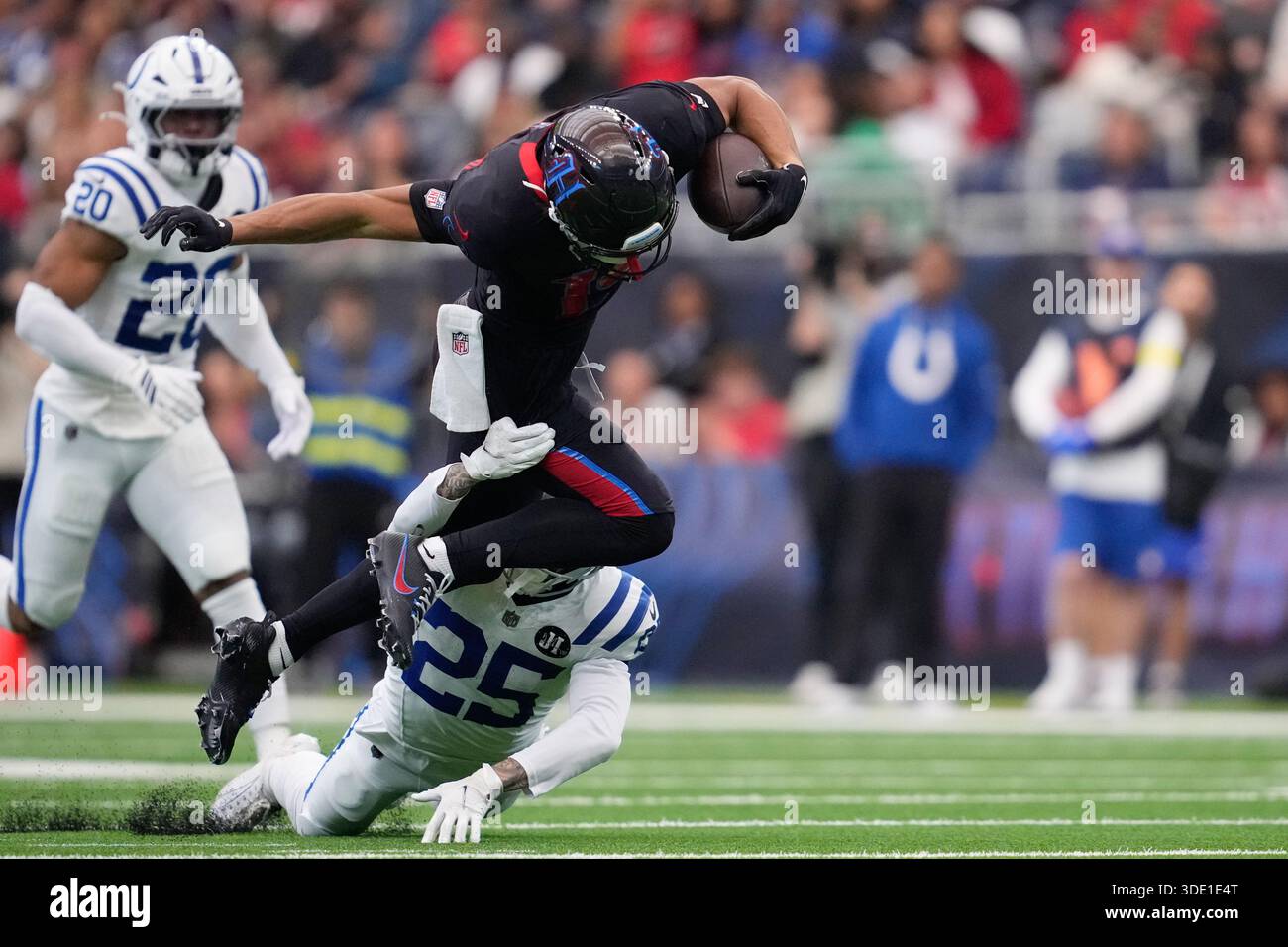 Houston Texans wide receiver Xavier Hutchinson (19) is hit by ...