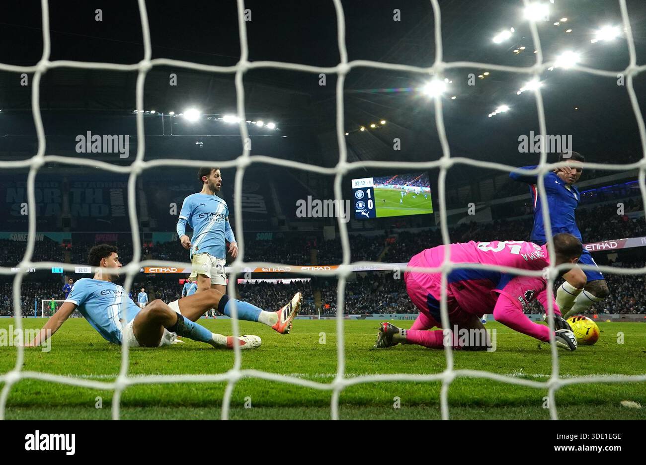 Chelsea's Enzo Fernandez (right) scores their side's first goal of the ...