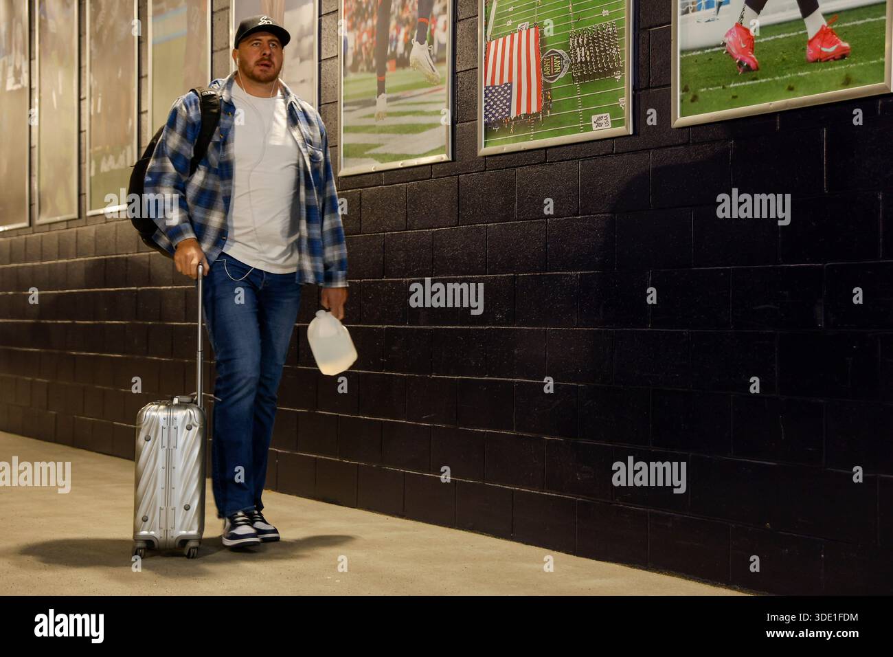 Miami Dolphins guard Daniel Brunskill (64) enters the stadium prior to ...