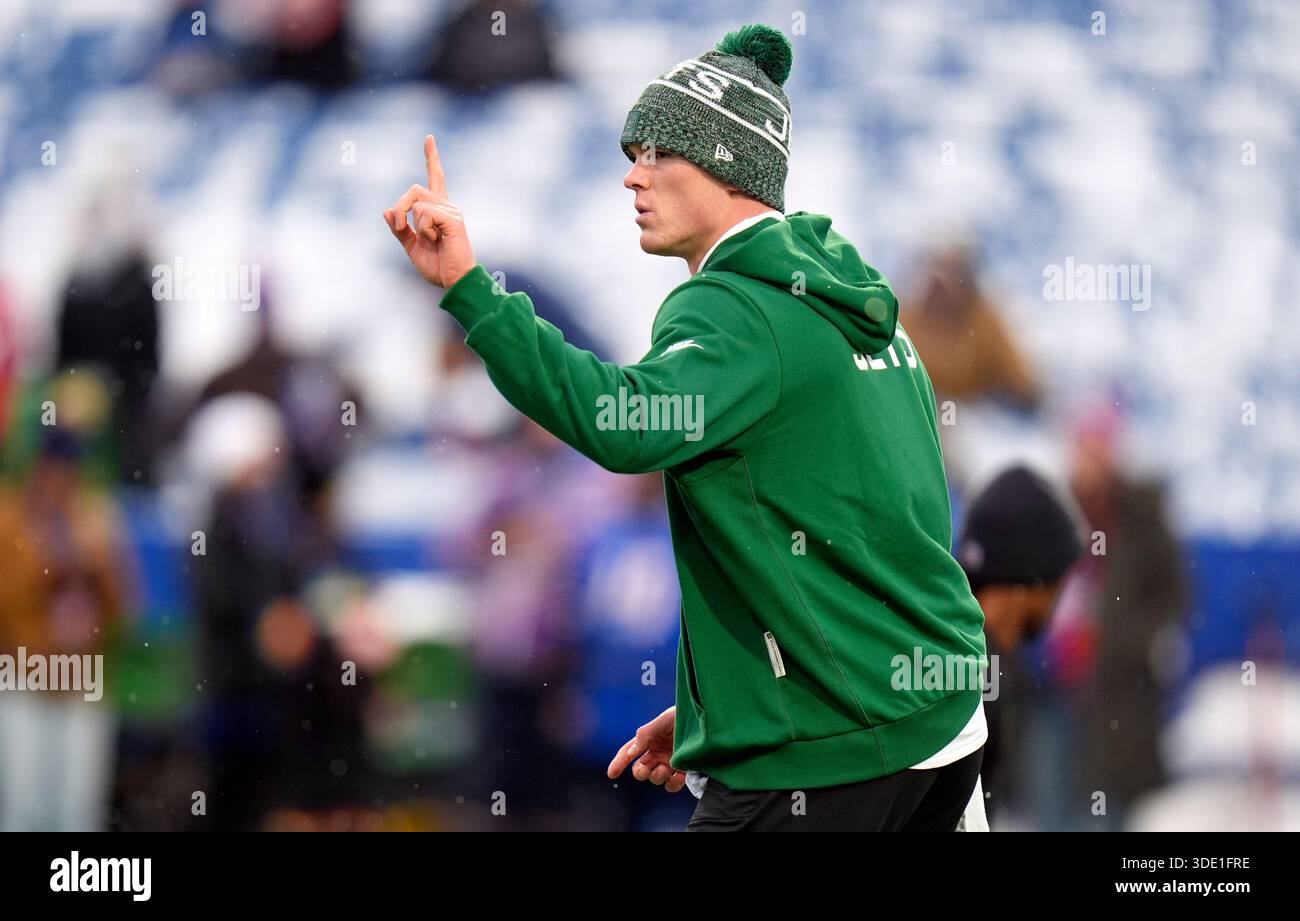 New York Jets quarterback Brady Cook warms up before an NFL football ...