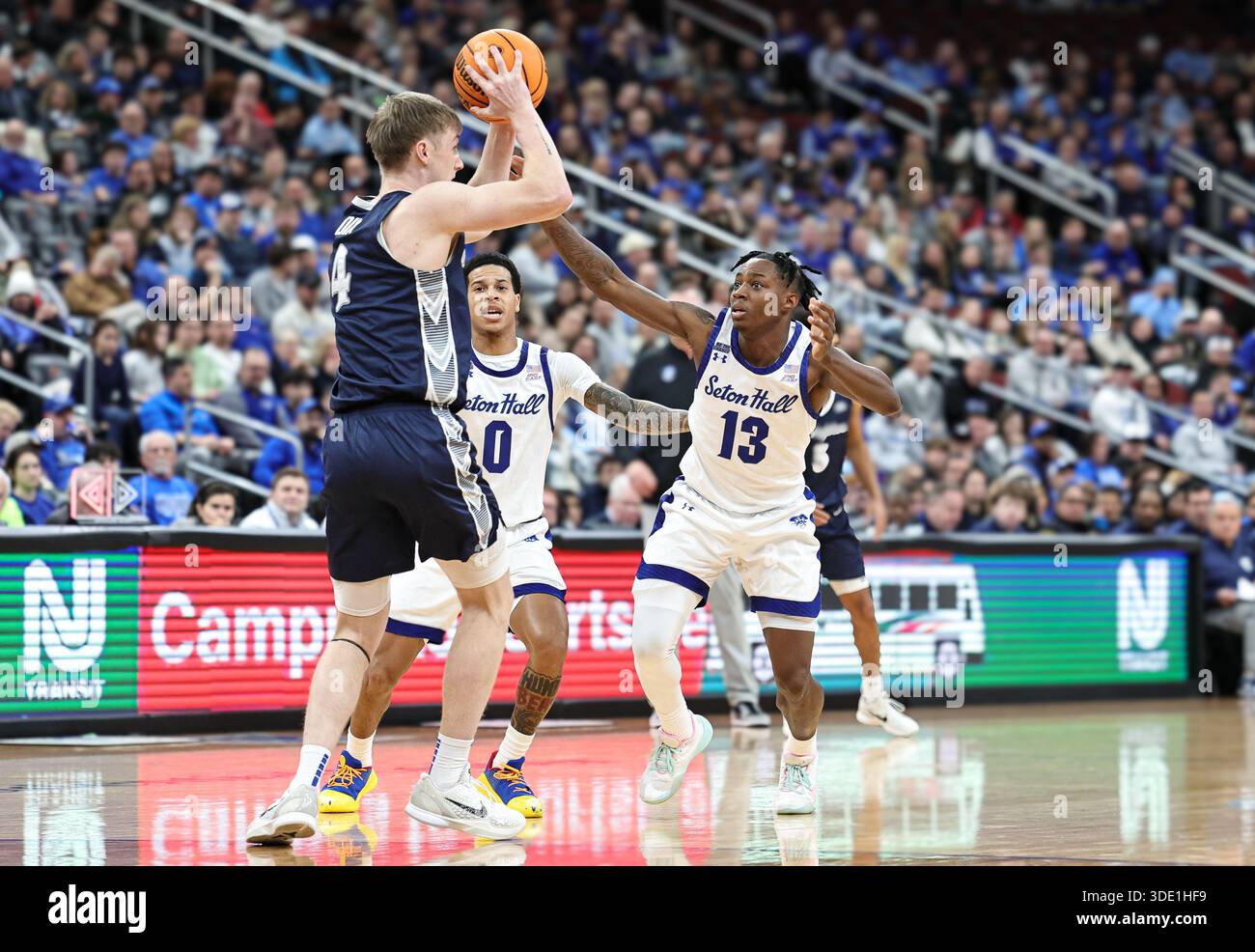 Seton Hall guard Trey Parker (13) and Seton Hall guard Adam Clark (0 ...