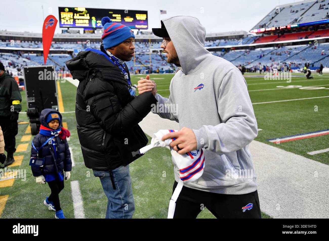 Vince Carter, left, a minority owner of the Buffalo Bills, greets Bills ...