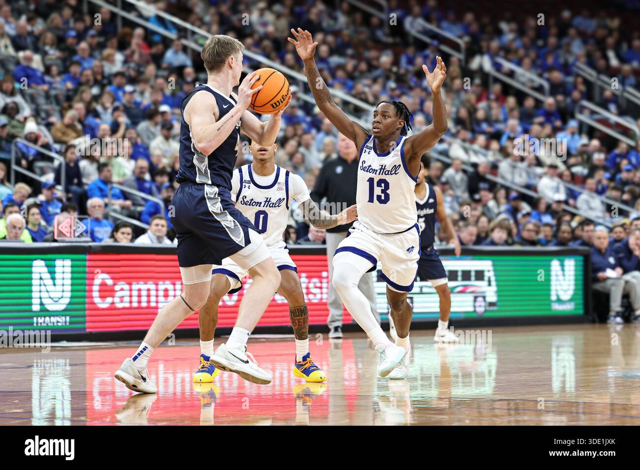 Seton Hall guard Trey Parker (13) and Seton Hall guard Adam Clark (0 ...