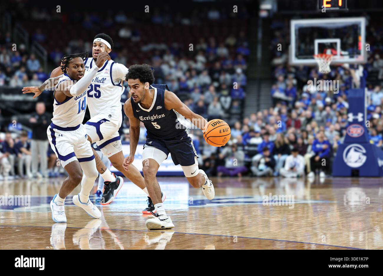 Creighton Bluejays guard Nik Graves (5) drives to the basket in the ...