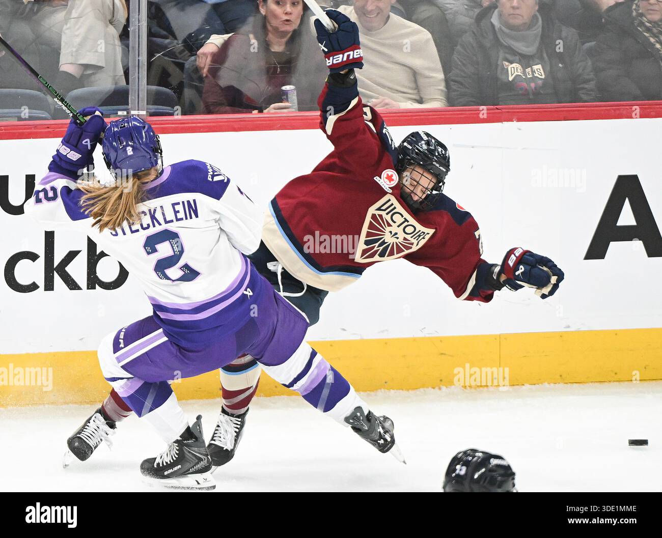 Minnesota Frost's Lee Stecklein (2) collides with Montreal Victoire's ...