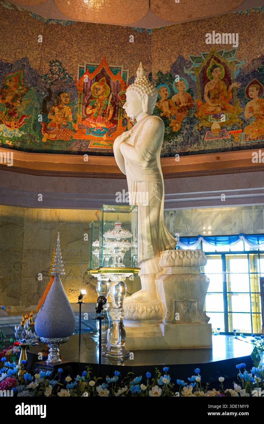 The standing Buddha statue and celestial mosaic dome of ...