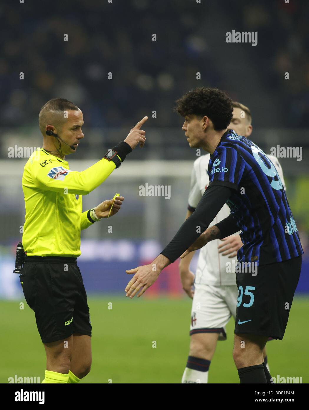 Referee showing a yellow card to Alessandro Bastoni of FC Inter during ...