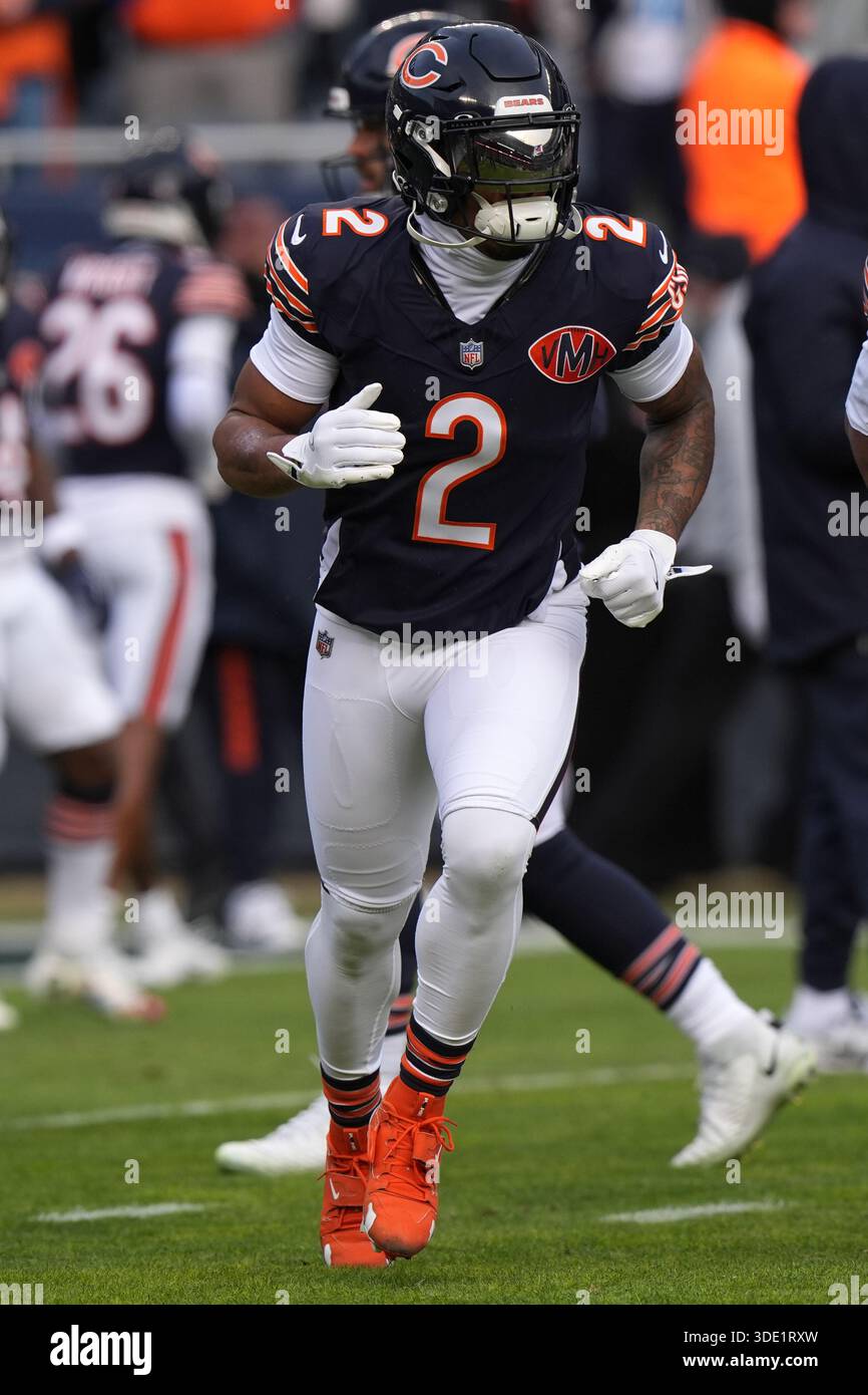 Chicago Bears wide receiver DJ Moore warms up before an NFL football ...