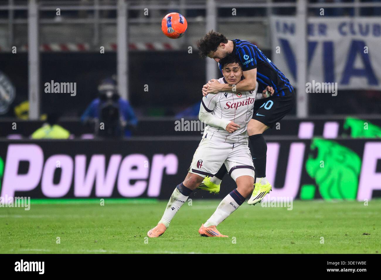 Carlos Augusto of FC Internazionale competes for a header with Santiago ...