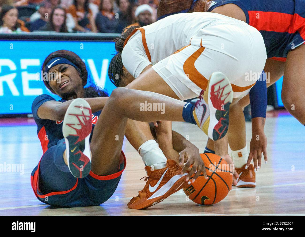 Mississippi forward Latasha Lattimore, left, and Texas forward Madison ...