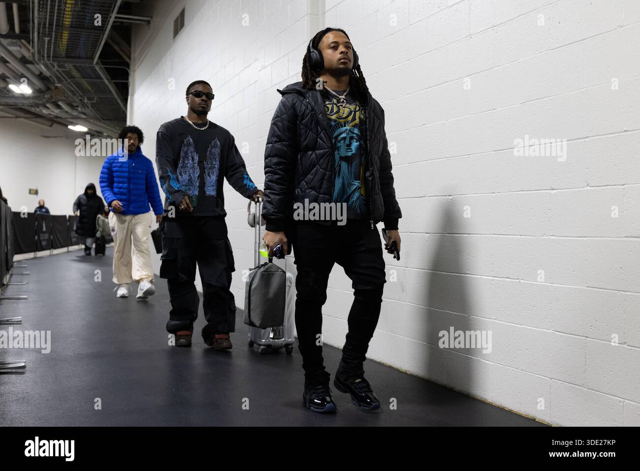Baltimore Ravens running back Keaton Mitchell (34) arrives before an ...