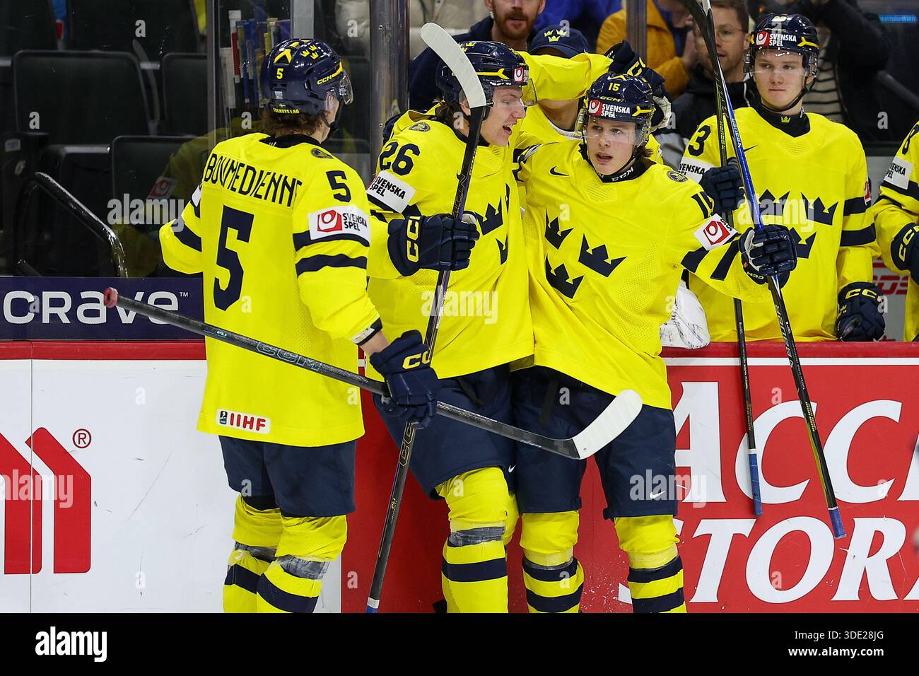 Sweden forward Ivar Stenberg, right, celebrates his goal with teammates ...