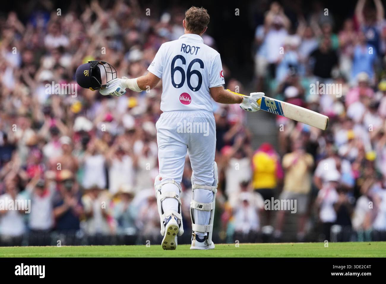England's Joe Root gestures to the England fans after scoring a century ...
