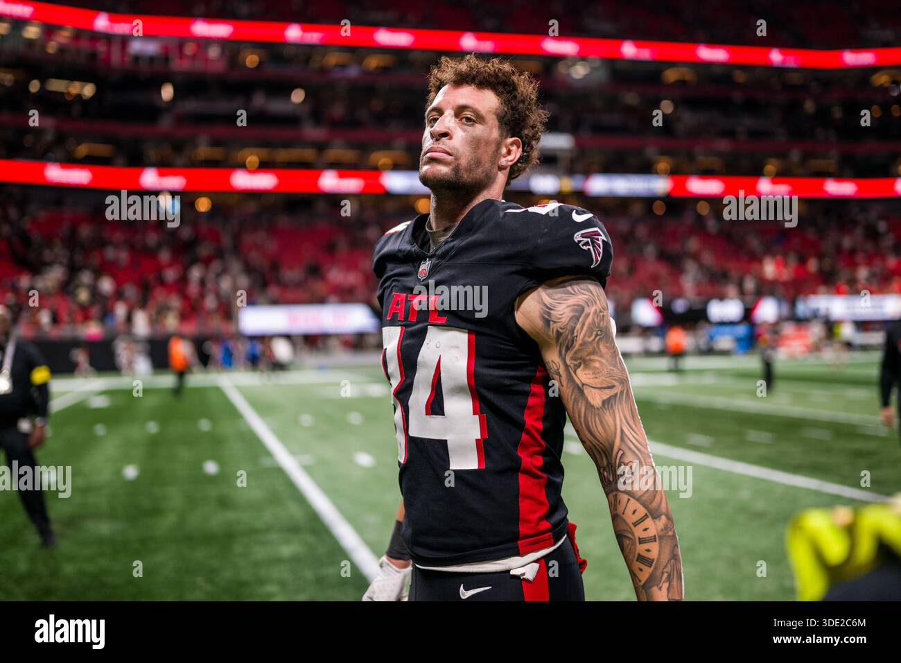 Atlanta Falcons tight end Feleipe Franks (84) walks off the field after ...