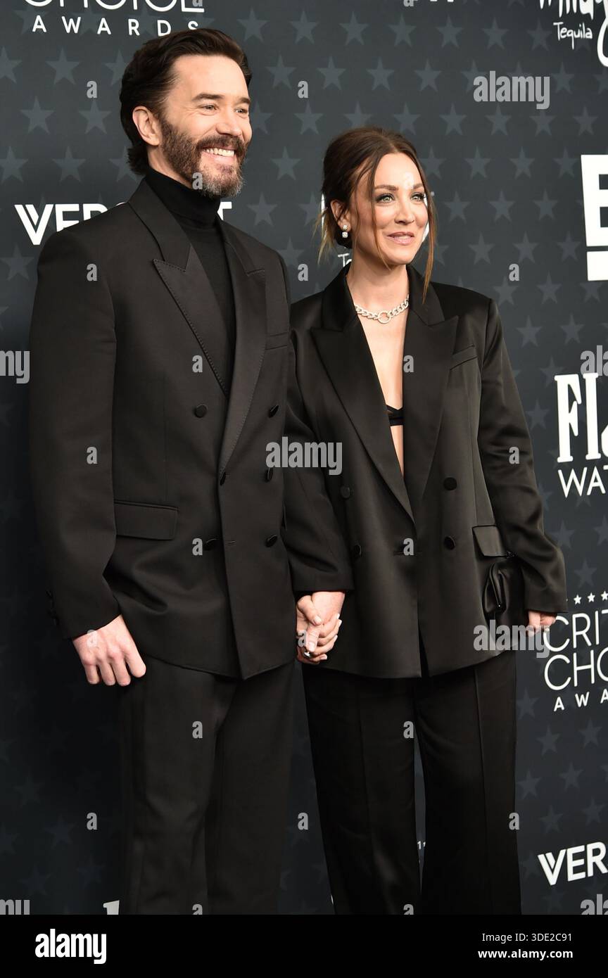 Tom Pelphrey, left, and Kaley Cuoco arrive at the 31st Annual Critics ...