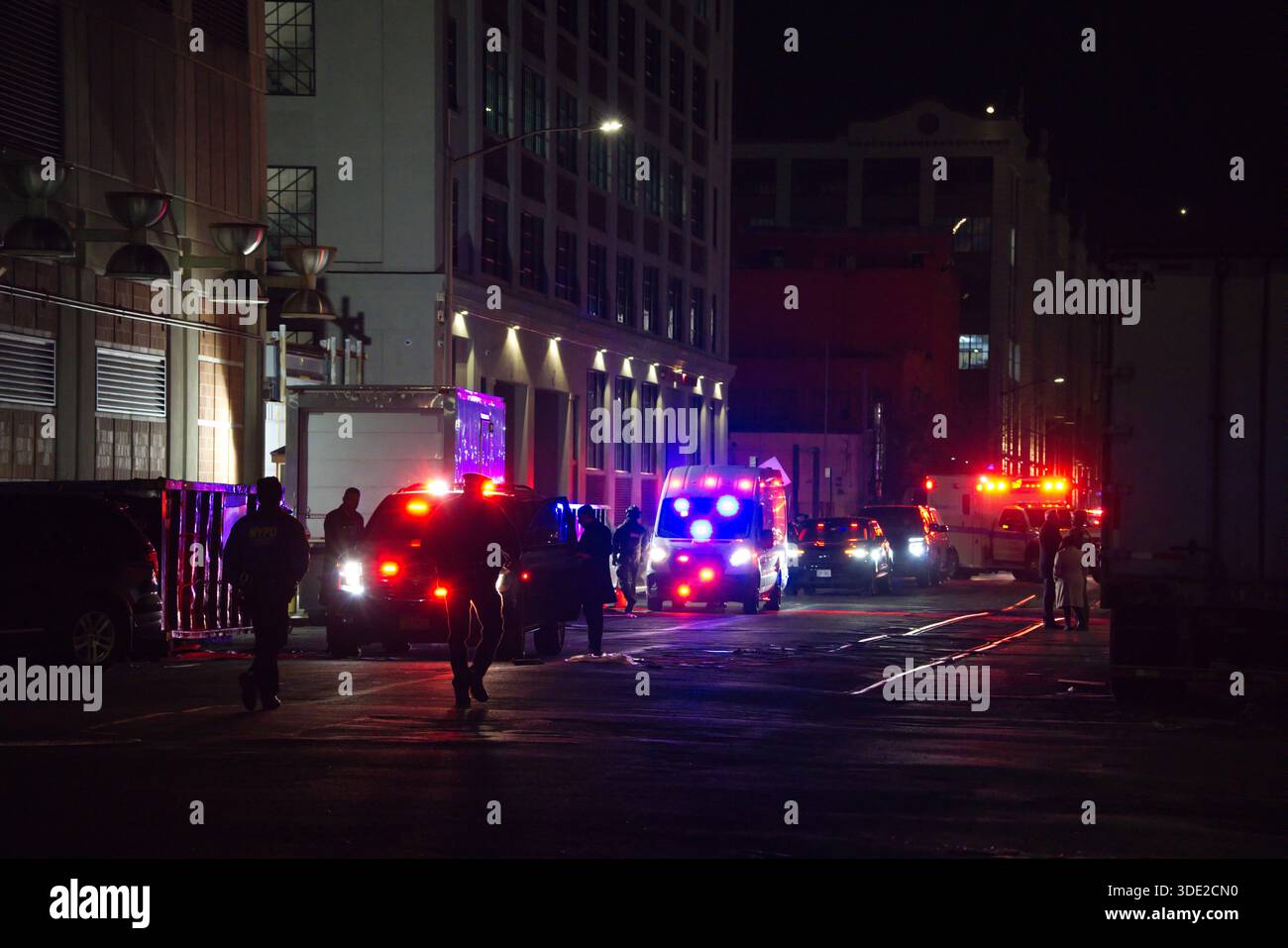 Nighttime emergency vehicles city street hi-res stock photography and ...