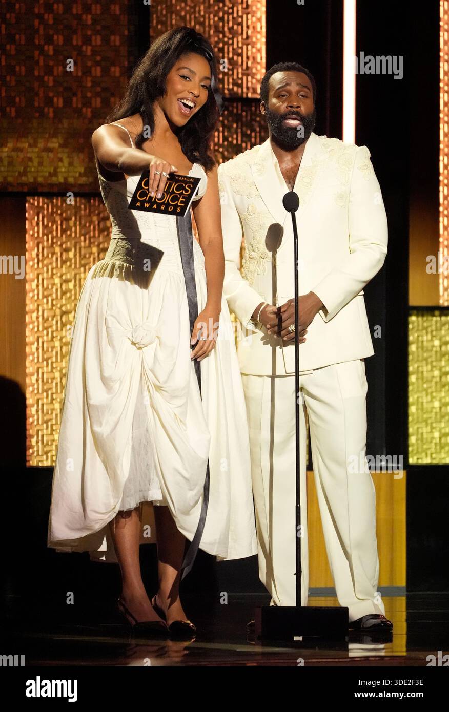 Jessica Williams, left, and Tramell Tillman present the award for best ...