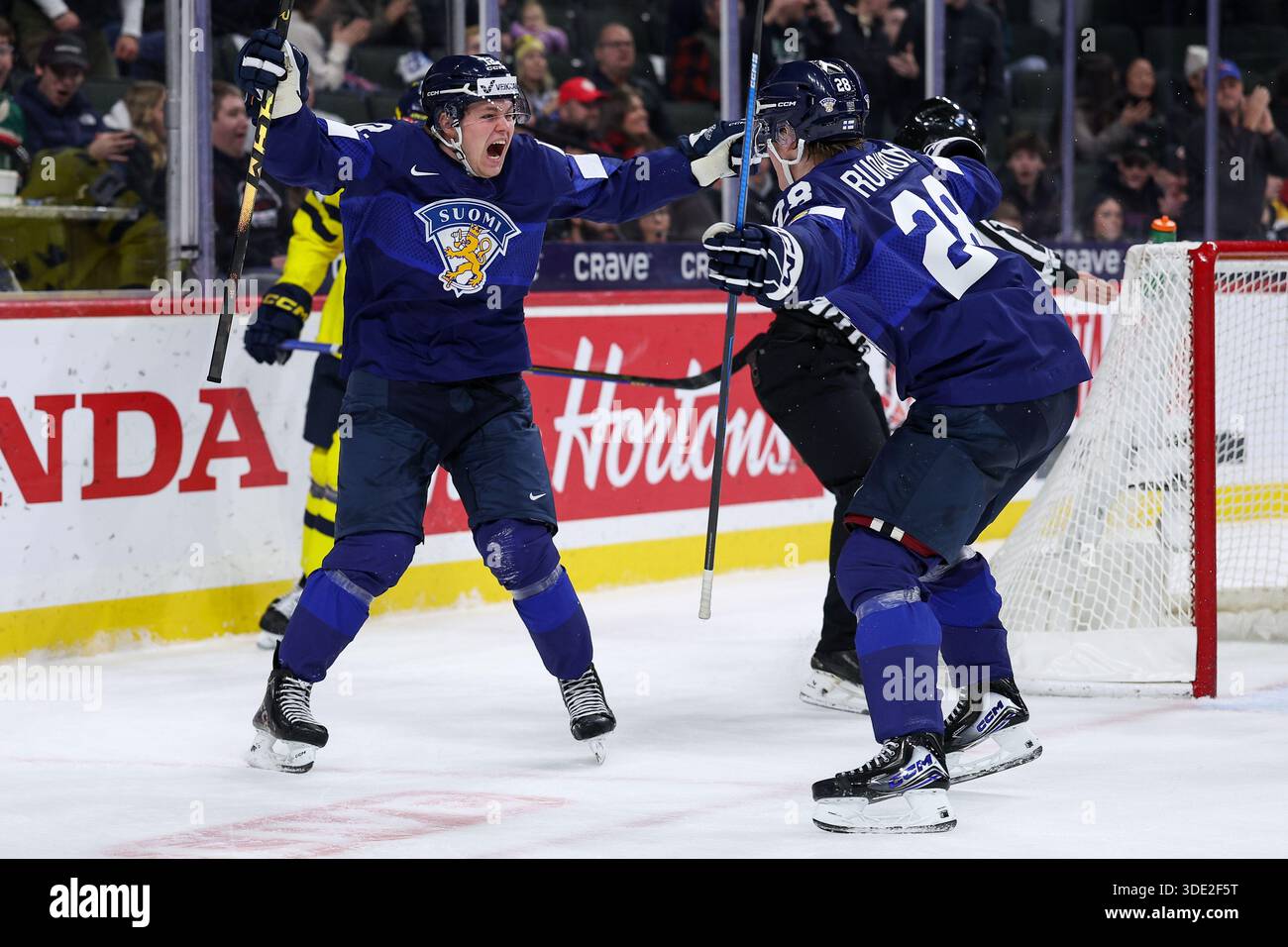 Finland forward Joona Saarelainen (12) celebrates his goal against ...