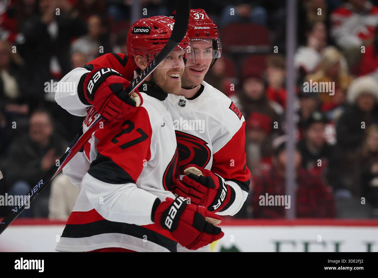 Carolina Hurricanes left wing Nikolaj Ehlers (27) and teammate Andrei ...