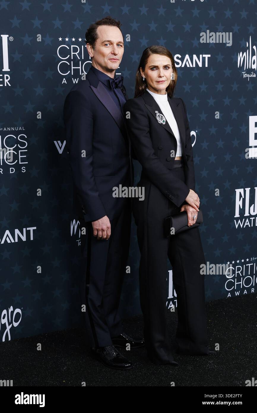 Matthew Rhys and Keri Russell walking on the red carpet at the 31st ...