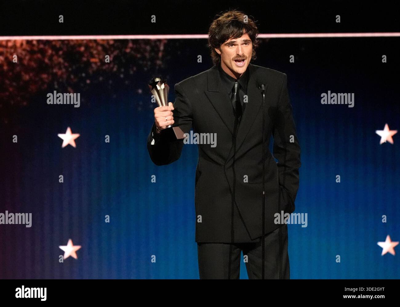 Jacob Elordi accepts the award for best supporting actor for ...