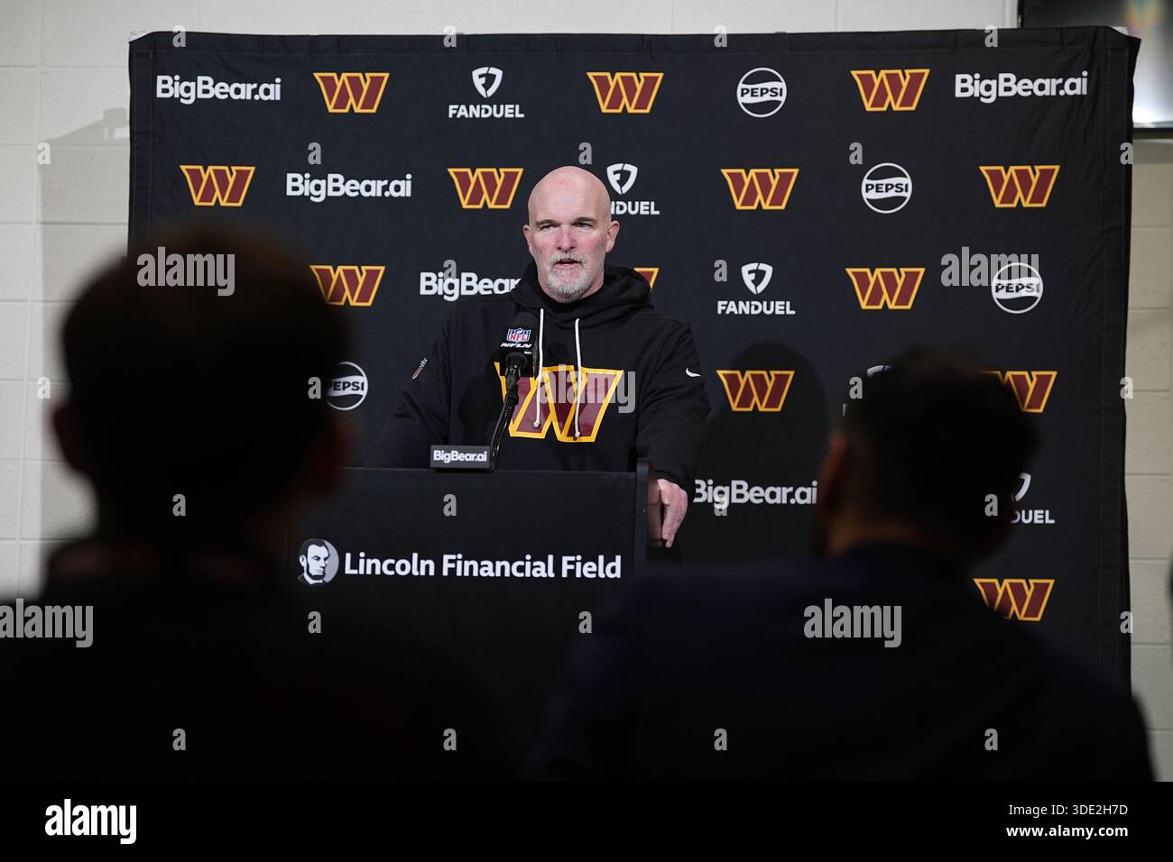 Washington Commanders head coach Dan Quinn speaks after an NFL football ...