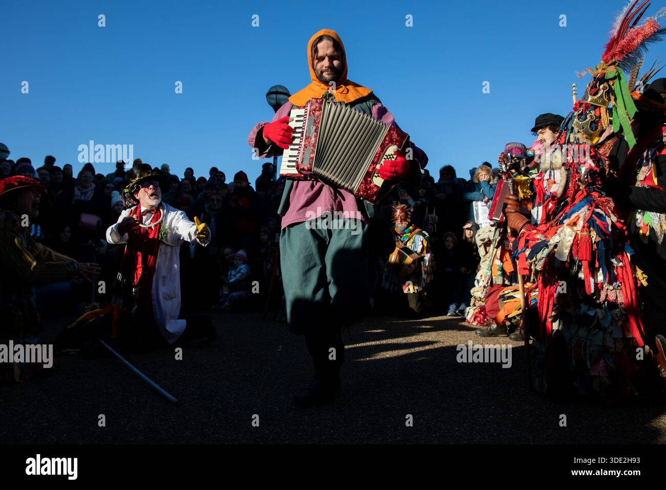 A musician from the Lions Play performs during the Twelfth Night ...