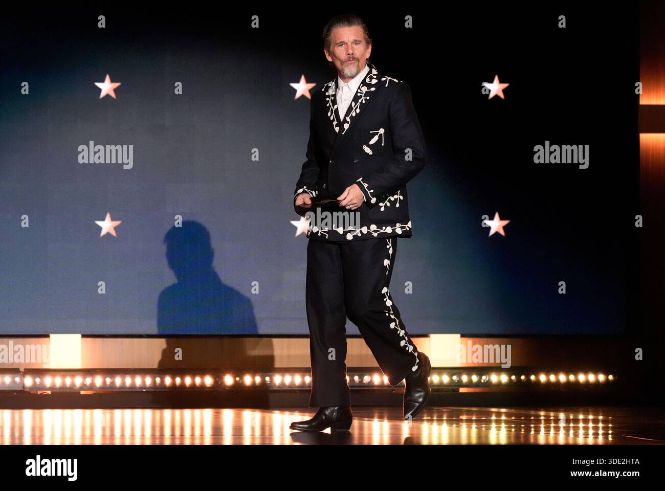 Ethan Hawke walks onstage to present the award for best supporting ...