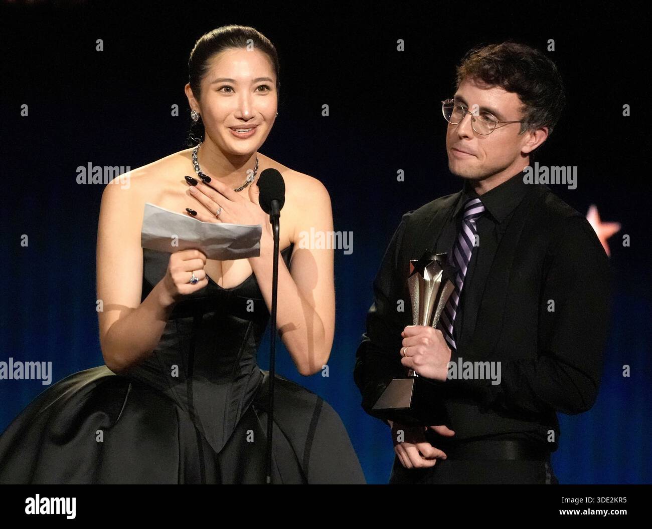 EJAE, left, and Mark Sonnenblick accept the award for best song for ...