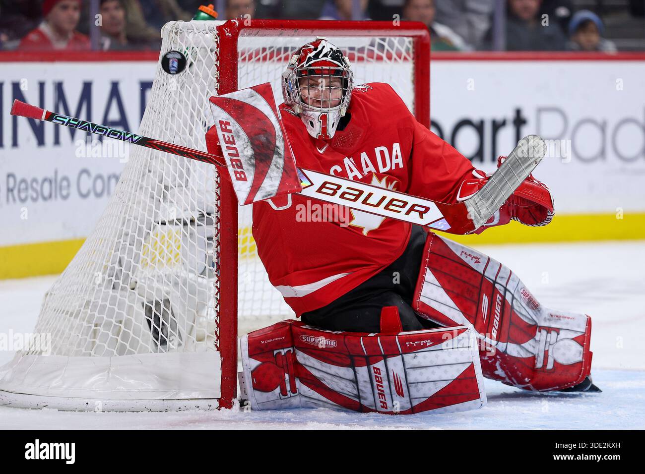 Canada goalie Jack Ivankovic defends his net during the first period of ...