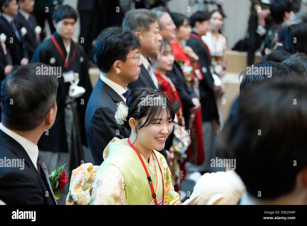 Staff of the Tokyo Stock Exchange and guests attend a ceremony marking ...