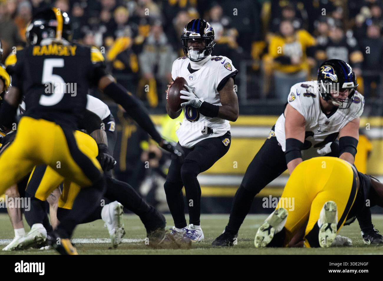 Baltimore Ravens quarterback Lamar Jackson (8) looks to pass during an ...