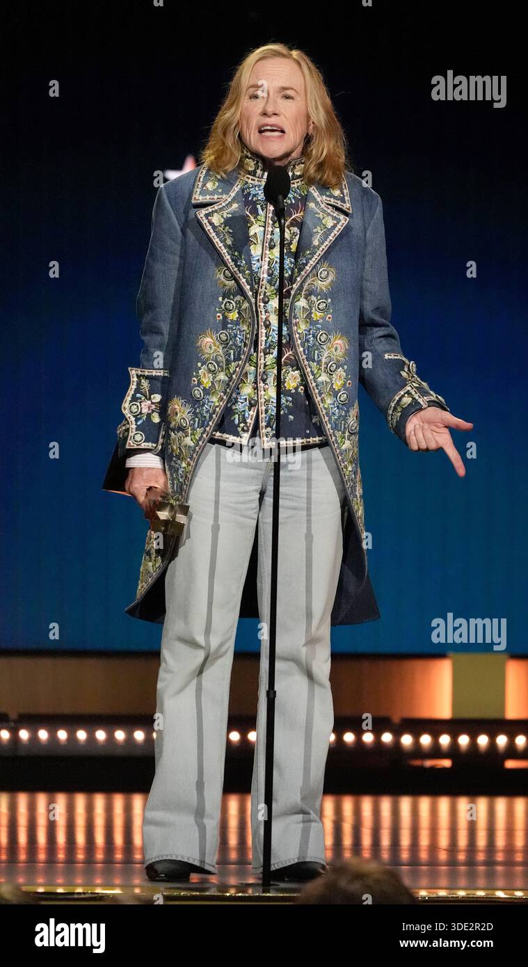 Amy Madigan accepts the award for best supporting actress for "Weapons ...